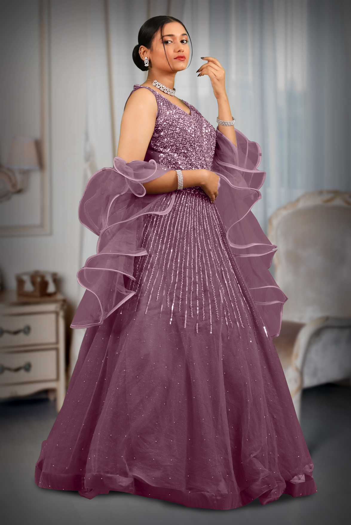 Moderate purple sequins & stone heavy gown with ruffles dupatta